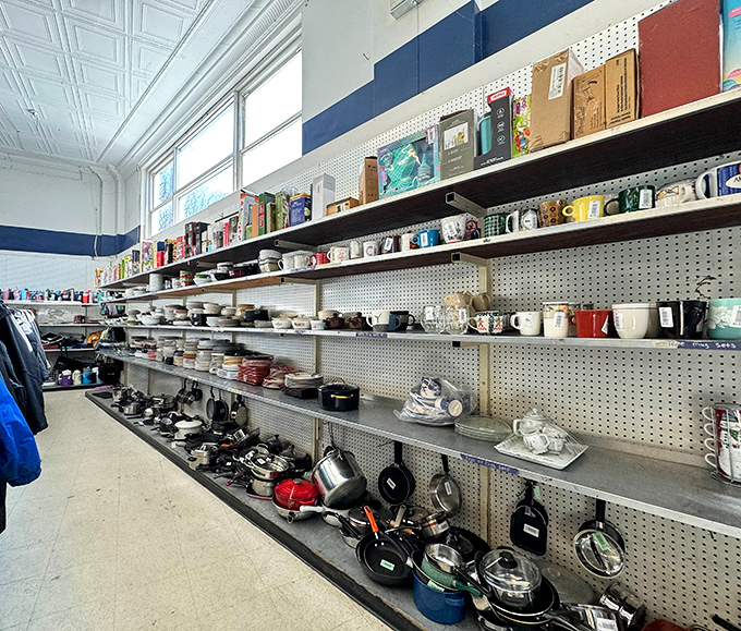 The kitchenware section: where forgotten coffee mugs and cast iron pans await their second act. Julia Child would approve of these culinary resurrection stories.