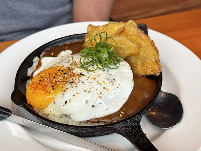 The legendary Koko Moco arrives in its cast iron throne &ndash; a sunny-side egg crowning garlic rice with gravy that would make your grandmother weep with joy.