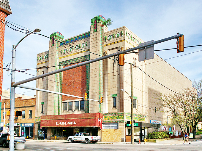 The Latonia Theater stands as a stunning Art Deco masterpiece. Its ornate green terra cotta facade is the kind of architectural detail you just don't see in modern buildings.