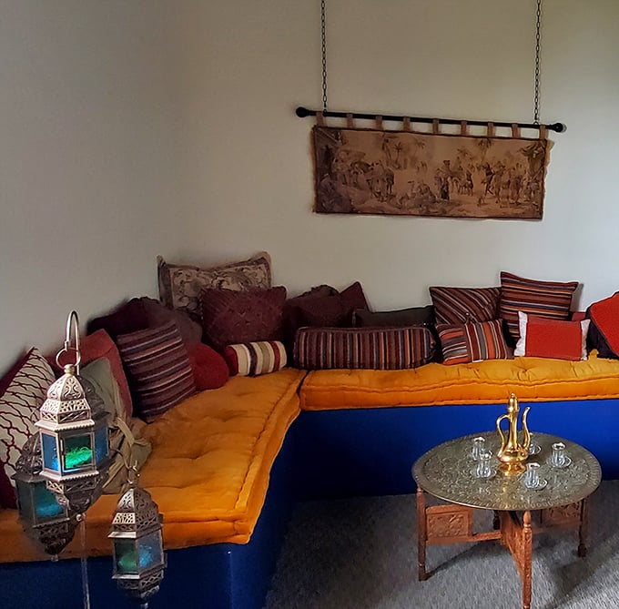 Low seating and vibrant textiles transport you somewhere between Marrakech and absolute contentment in the American heartland.