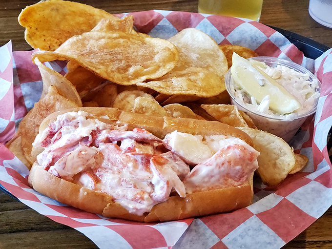 Lobster roll perfection: sweet, tender meat barely kissed with mayo, nestled in a buttery split-top bun. Worth crossing state lines for.