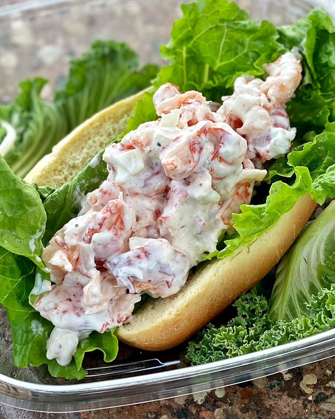 This lobster roll isn't just a sandwich; it's a coastal vacation between two pieces of bread.