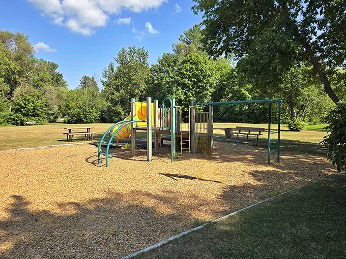 Childhood laughter echoes across this playground where equipment waits patiently for the next generation of imaginative adventures and skinned knees.