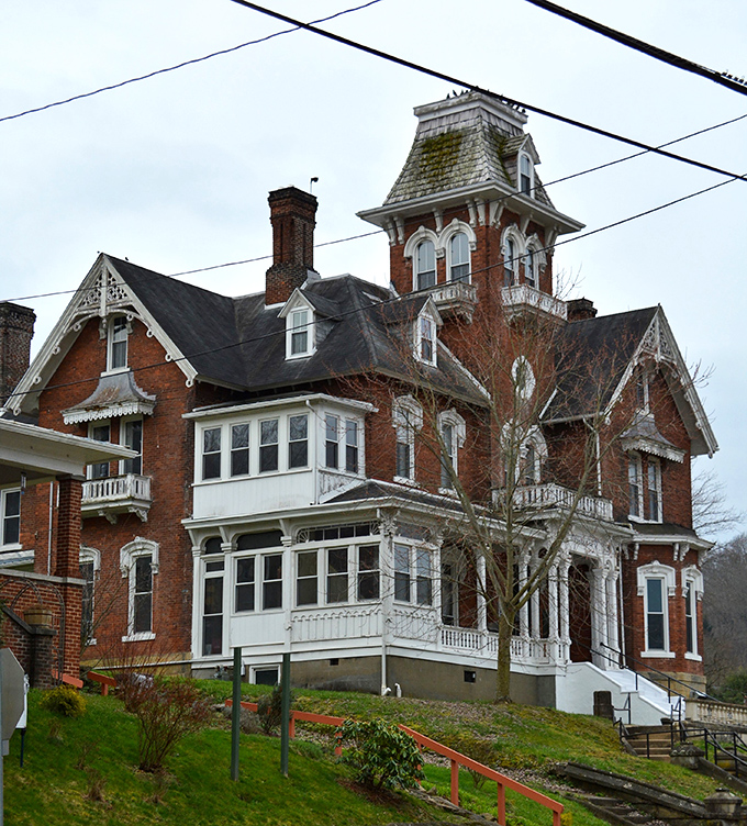 Victorian elegance meets historical significance in this red brick mansion. The ornate tower and detailed woodwork speak to craftsmanship that's become a lost art in today's prefab world.