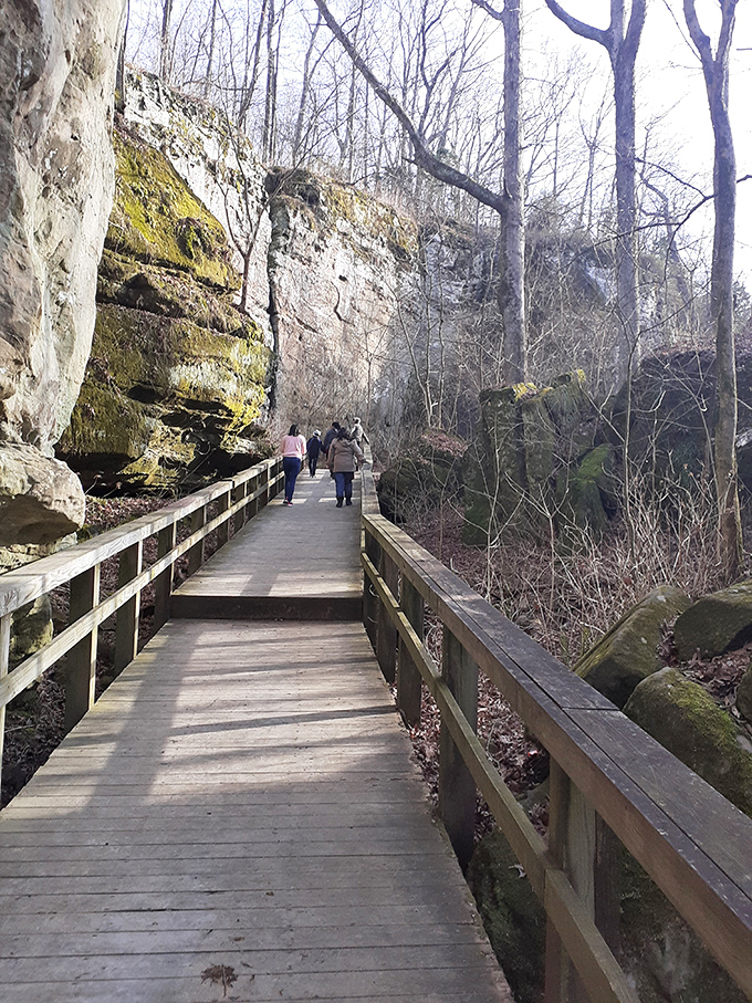 Nature's hallway: walking this boardwalk between towering rock walls feels like entering Earth's own grand cathedral.
