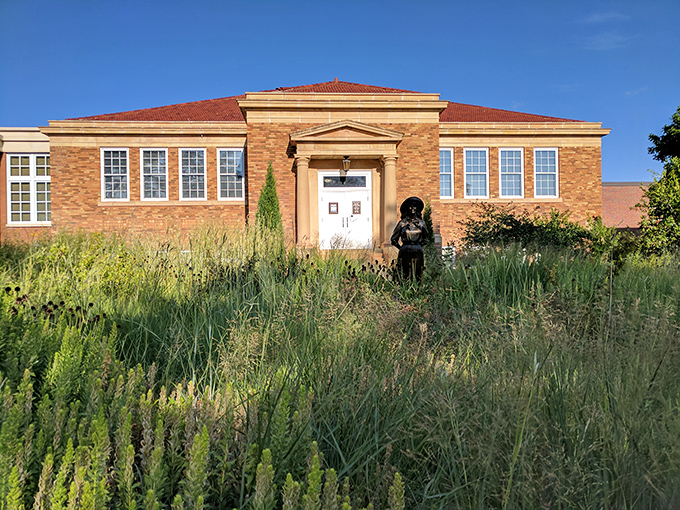 This stately brick building houses the Mari Sandoz Heritage Center, where prairie tales come alive amid native grasses and sunshine.