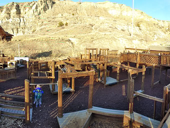 This wooden playground might be the only place where kids burn energy while parents enjoy the geological masterpiece looming in the background.