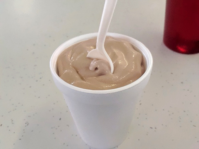 This isn't just a milkshake; it's a time machine in a styrofoam cup. Thick enough to make your straw stand at attention.