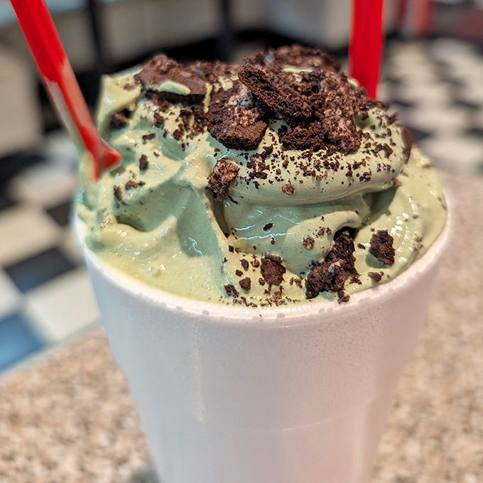 This isn't just a mint chocolate chip milkshake &ndash; it's a structural engineering marvel that requires both a straw and a spoon to properly appreciate.