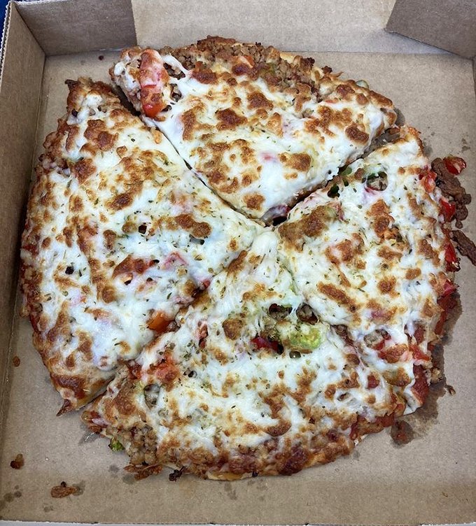 Pizza perfection in its purest form. This golden-brown disc of joy features a harmonious marriage of melted cheese, savory toppings, and that signature Orsi's crust.