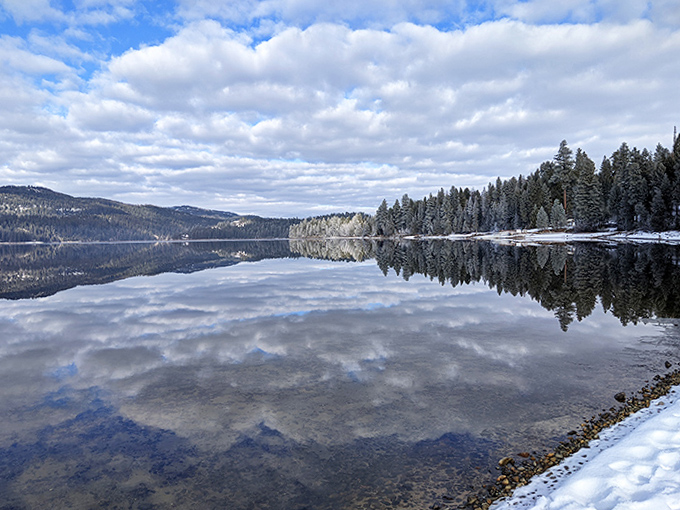 When the lake turns mirror-smooth, even the clouds stop to admire themselves&mdash;and honestly, who can blame them?