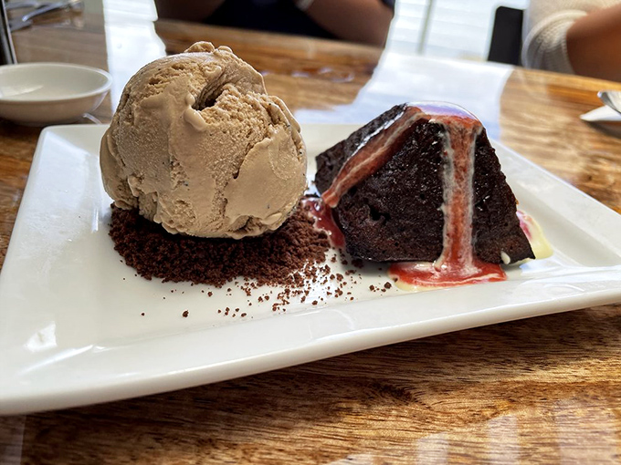 Chocolate nirvana awaits in this molten lava cake with ice cream &ndash; a dessert that erupts with flavor much like its volcanic namesake.