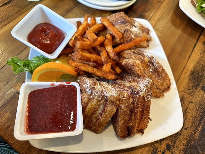 Behold the Monte Cristo in all its golden glory – where French toast meets sandwich in delicious matrimony.