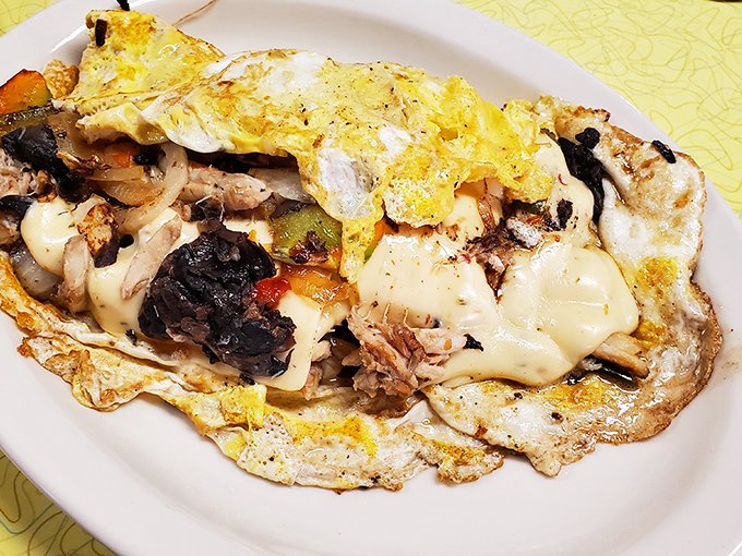 Not so much an omelet as an edible work of art. When cheese pulls like this, you know you've found breakfast nirvana.