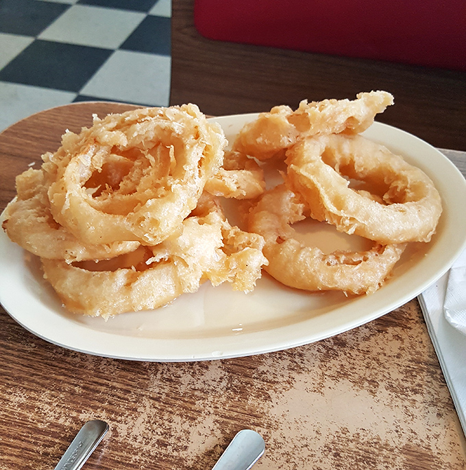 Golden, crispy onion rings that shatter with each bite&mdash;proof that simplicity, when done right, needs no fancy introduction.