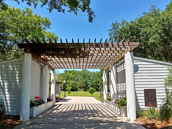 This elegant pergola walkway creates the perfect frame for whatever second act you're planning in life's ongoing production.