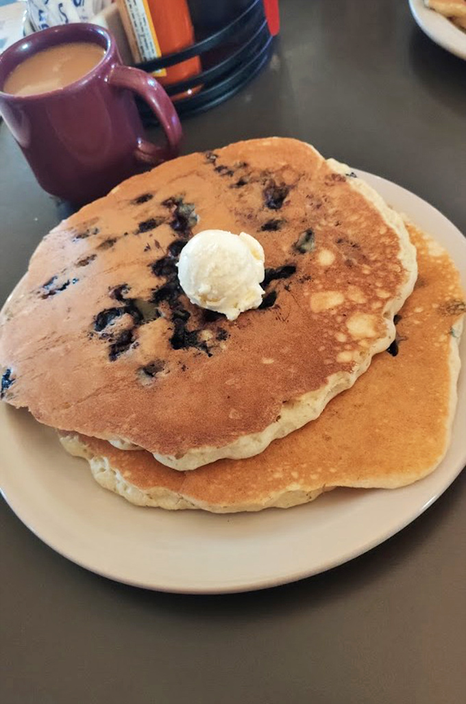These blueberry pancakes aren't just breakfast, they're an edible love letter to mornings in Wyoming. That pat of butter is just melting with anticipation.