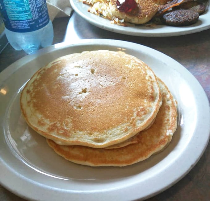 Golden-brown pancake perfection that would make your grandmother weep with joy &ndash; fluffy, substantial, and ready for their syrup bath.