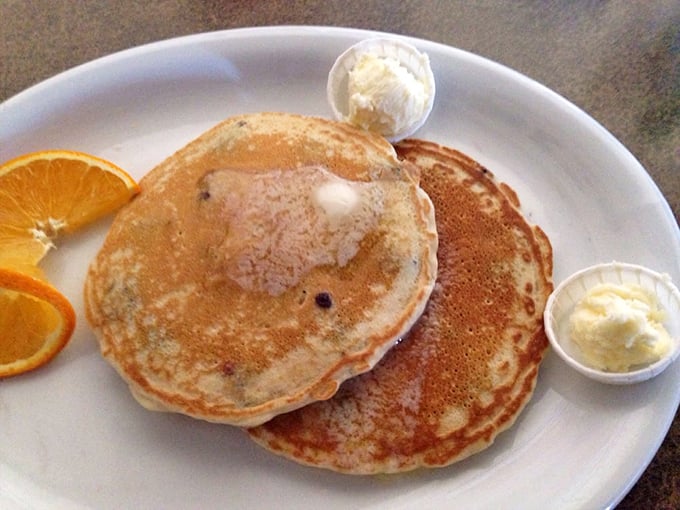 Golden pancake perfection that makes you question every other pancake you've ever met. Those butter pats aren't melting &ndash; they're swooning.