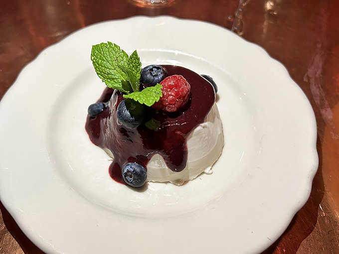 Panna cotta so perfectly jiggly, it could star in its own Italian rom-com alongside the berry compote.