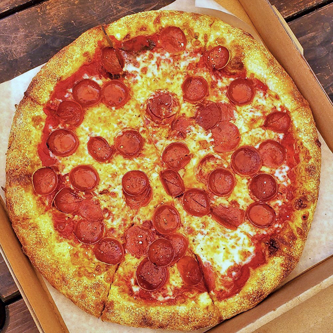 Behold the pepperoni pizza in all its cupped, crispy-edged glory! Those little pools of spiced oil are nature's way of saying "this is going to be a good day."