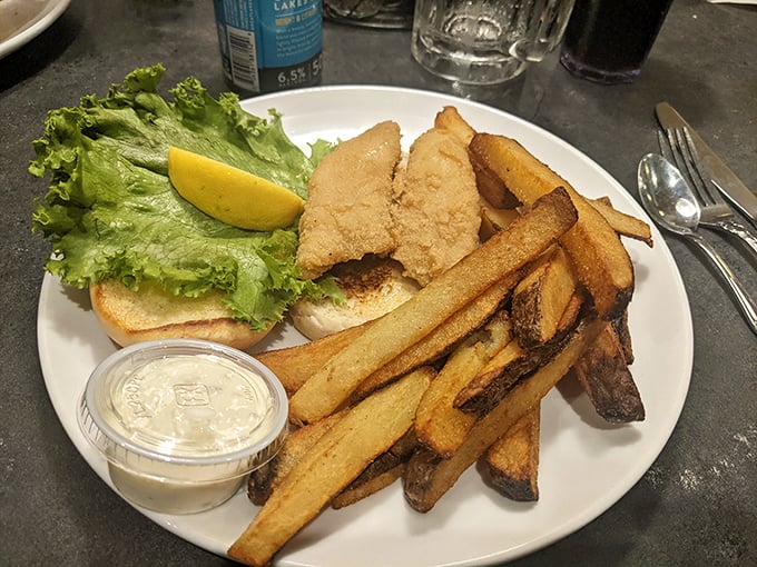 Behold the star of the show: golden-fried Lake Erie perch on a brioche bun with crispy fries. This isn't just a sandwich&mdash;it's an Ohio cultural institution.
