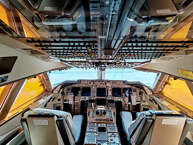 More buttons and switches than a 1960s sci-fi movie. This cockpit makes your car's dashboard look like a child's toy. 