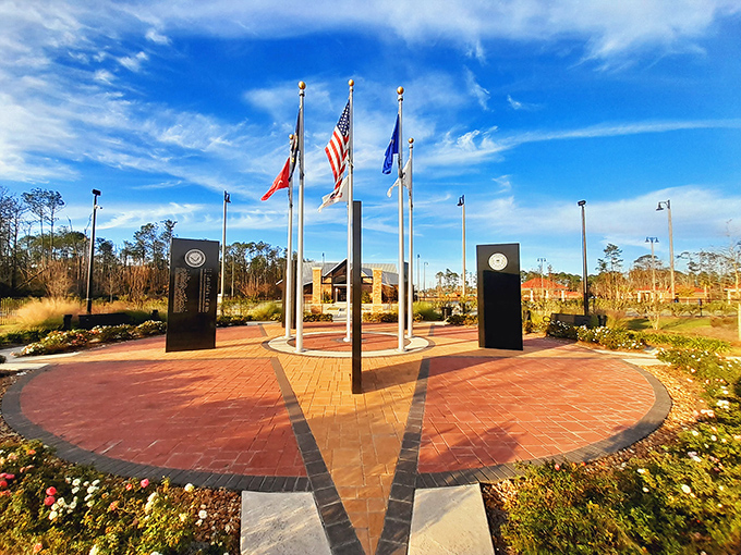 Pinederosa Park's veterans memorial stands as a dignified tribute. Those flags aren't just cloth and color – they're stories of service and sacrifice.