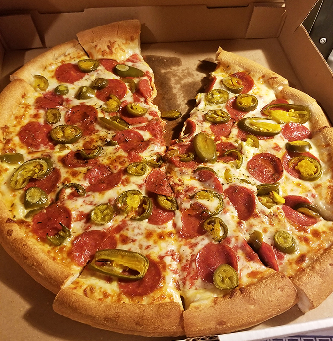 Pizza perfection doesn't need fancy words &ndash; just look at those jalape&ntilde;os and pepperoni playing so nicely together. The cheese pull potential is magnificent.