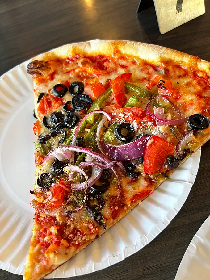 This veggie slice isn't trying to be healthy&mdash;it's trying to be delicious. Mission accomplished with those perfectly caramelized red onions and black olives.