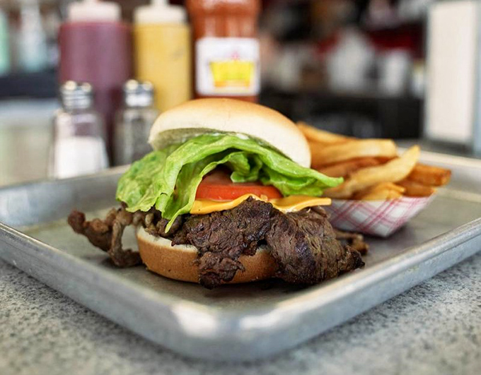 This barbecue sandwich isn't just lunch—it's a Norfolk tradition on a bun, with those hand-cut fries standing by for their supporting role.