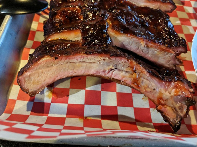 These aren't just ribs; they're edible evidence that patience is indeed a virtue. That smoke ring speaks volumes without saying a word. 
