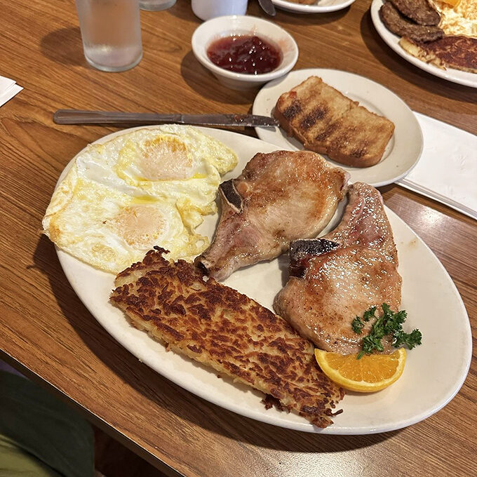 Breakfast doesn't need reinvention when it's this good. Golden hash browns, perfectly cooked eggs, and pork chops that would make your grandmother nod in approval.