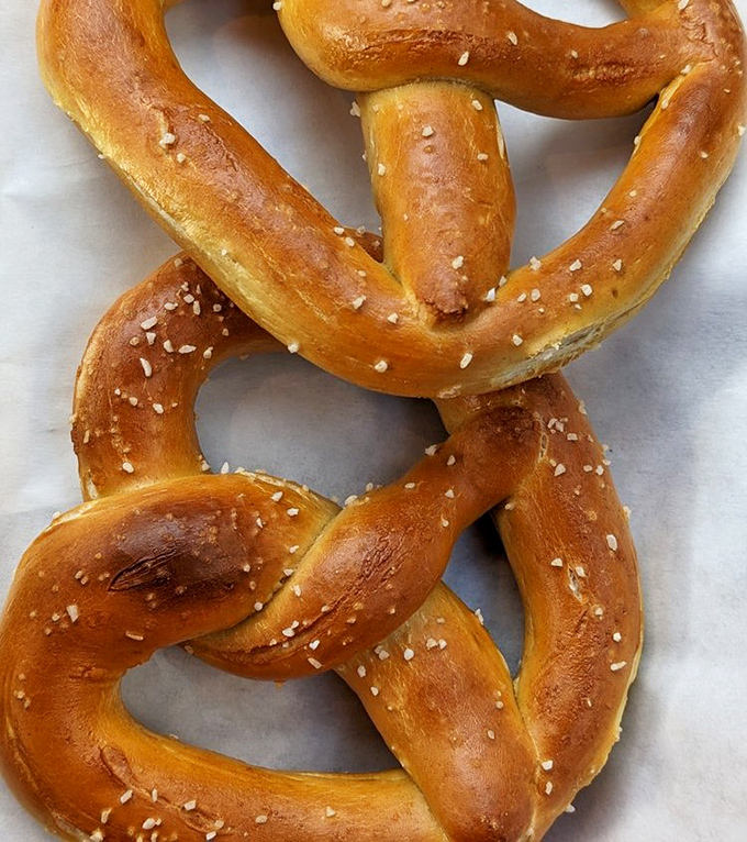 Golden-brown perfection in twisted form. These hand-crafted pretzels aren't just snacks&mdash;they're edible pieces of American history.