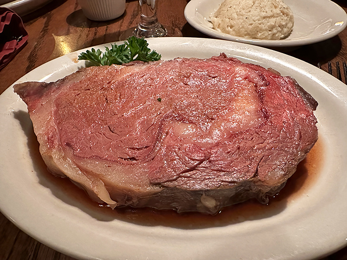 This prime rib isn't just dinner; it's a religious experience—perfectly pink, impossibly tender, and worthy of pilgrimage.