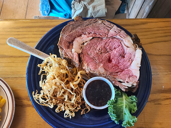 Prime rib so perfectly executed it deserves its own fan club &ndash; pink, tender, and accompanied by crispy onion strings and savory au jus.