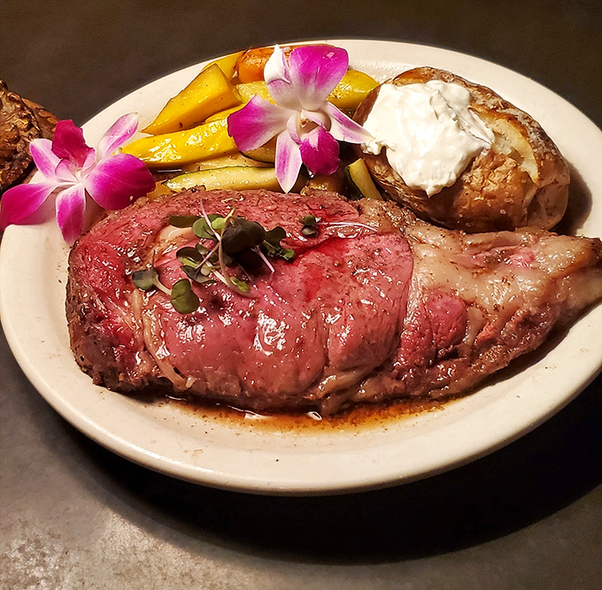 The star of the show: prime rib so perfectly prepared it deserves its own spotlight. That baked potato sidekick isn't just playing a supporting role either.