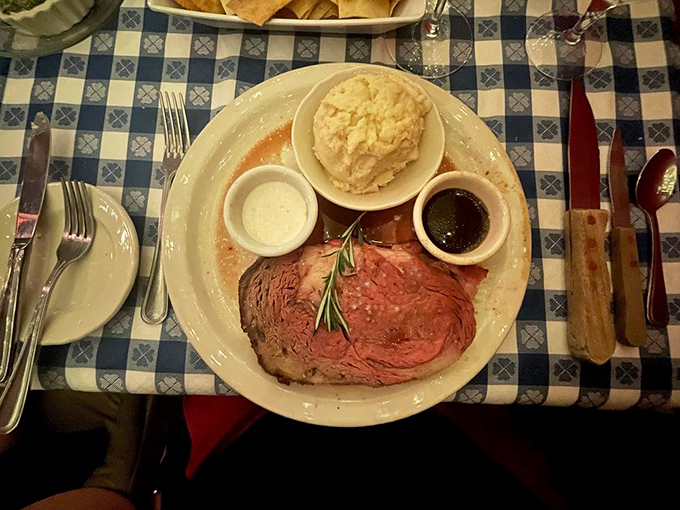 Prime rib so perfectly cooked it should have its own Instagram account. The rosemary sprig isn't garnish&mdash;it's a crown.