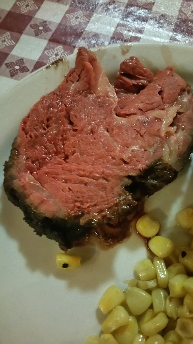 Prime rib so perfectly pink it should have its own Instagram account. This isn't just meat; it's a masterpiece of patience and precision.
