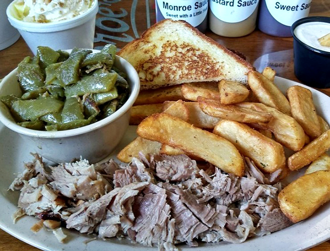Pulled pork that doesn't need a fancy introduction, served with green beans that actually taste like vegetables should. This plate means business.