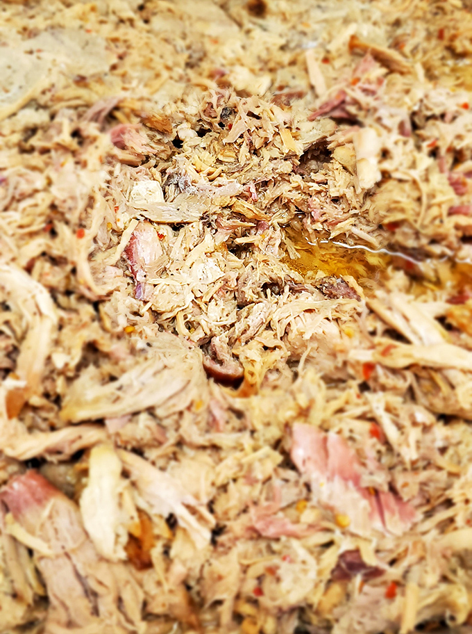 Behold the holy grail of pulled pork&mdash;tender strands of smoky perfection that make you question why you've eaten anything else.