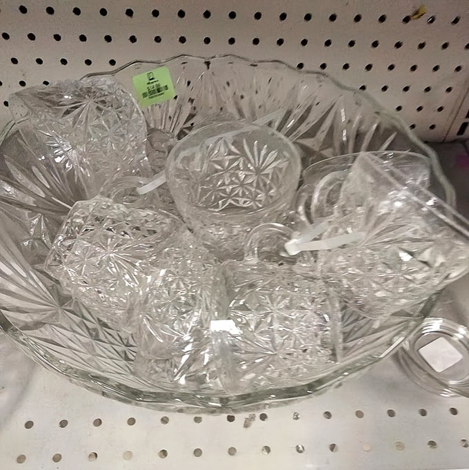 Crystal punch bowl sets sparkle like diamonds, waiting to host their next gathering of bridge club champions.