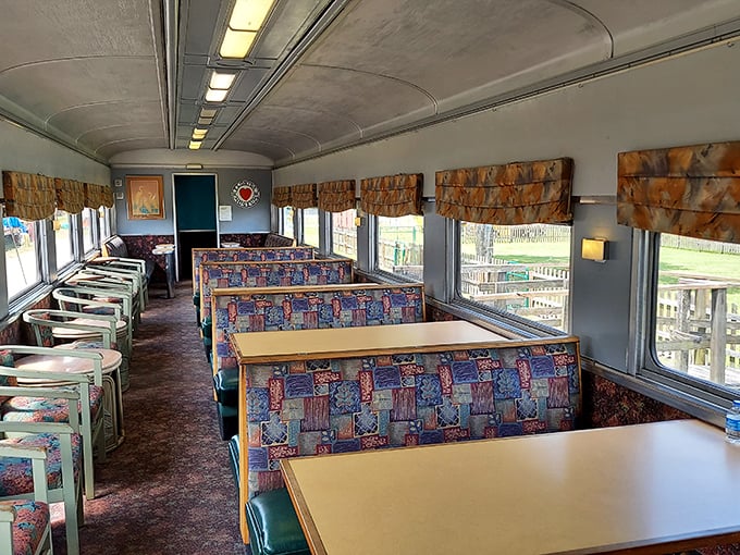 Dining car elegance awaits with booth seating that whispers tales of mid-century travel, when meals on rails were part of the adventure.