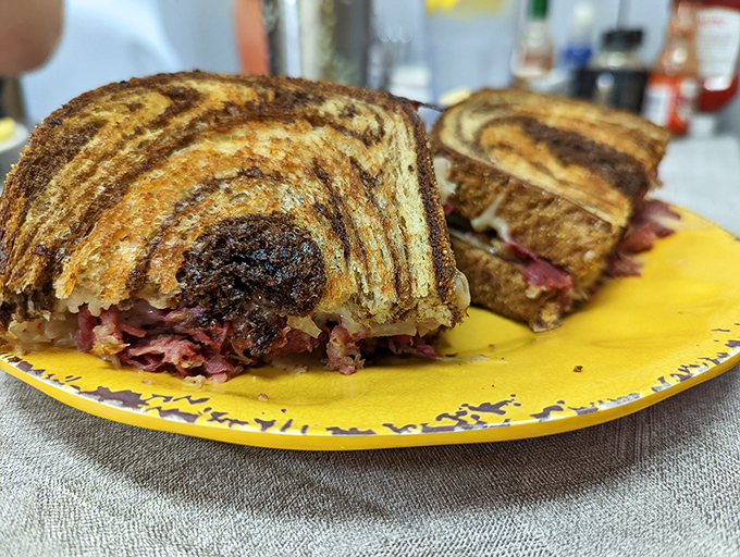 This isn't just a sandwich; it's a masterpiece of corned beef architecture. The Reuben at Blue Berry Caf&eacute; demands both hands and your undivided attention.