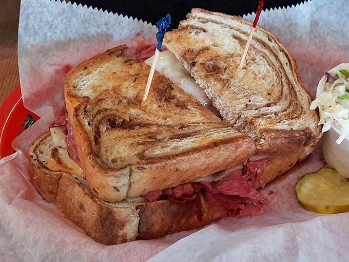Behold the star of the show: a Reuben sandwich so perfectly grilled and generously stuffed, it makes you wonder why you'd ever order anything else.