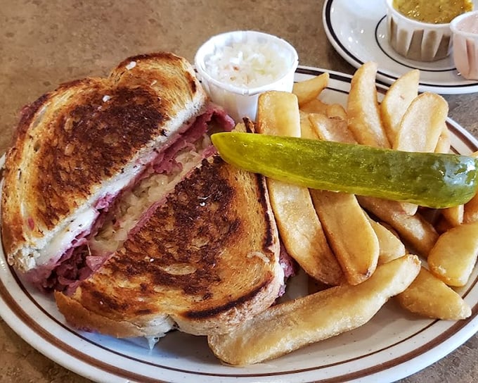 A perfectly grilled Reuben that would make New York delis jealous. That golden-brown crunch gives way to warm, savory goodness inside.