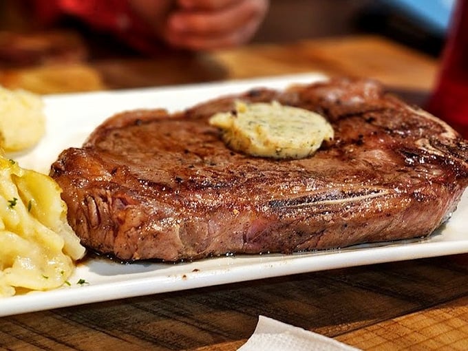Behold the star of the show &ndash; a perfectly seared ribeye with compound butter melting into beefy perfection. Resistance is futile.