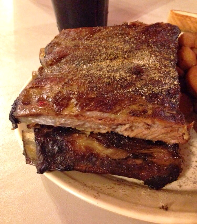 These ribs don't just fall off the bone&mdash;they practically leap into your mouth, sporting that perfect pink smoke ring that barbecue aficionados dream about.
