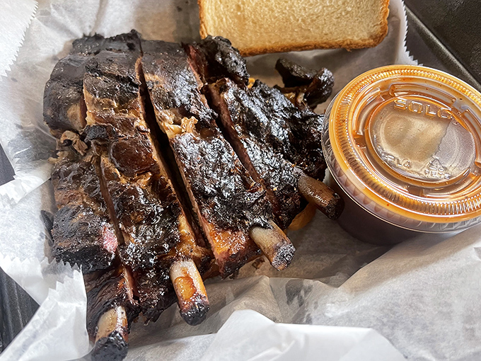 These ribs don't just fall off the bone &ndash; they practically leap into your mouth with that perfect bark and smoke ring.