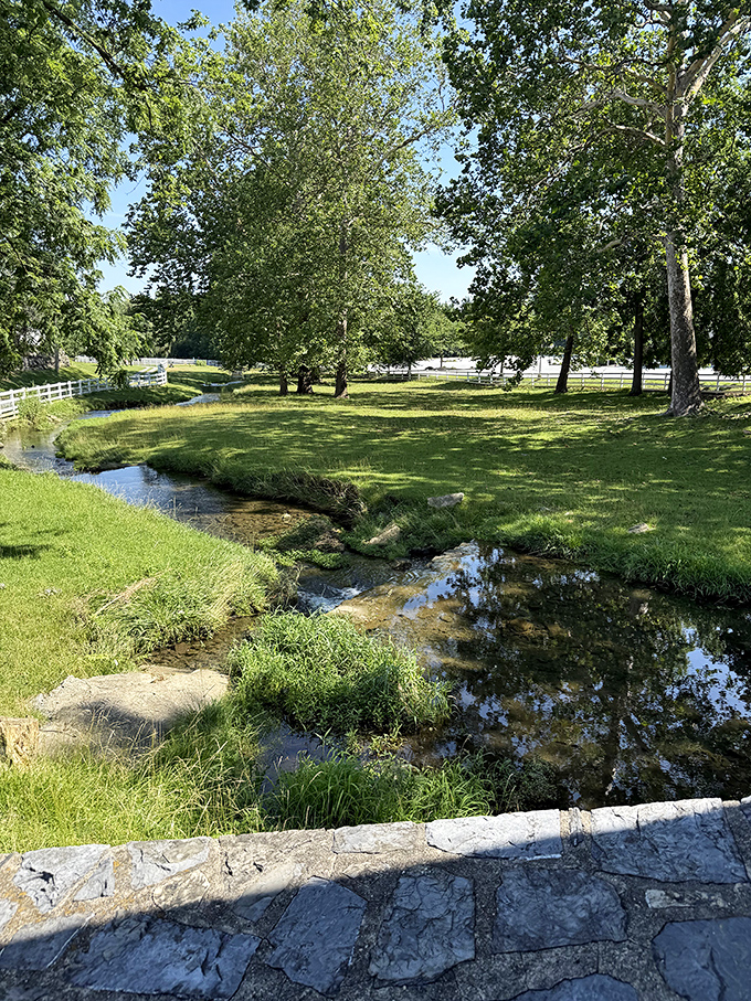 The gentle cascade beneath tells its own story. Water's been flowing under this bridge since horse-drawn buggies were the sports cars of their day.